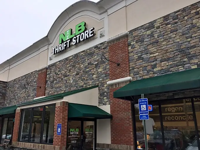 The stone and brick exterior of NLB Thrift Store in Woodstock gives off more upscale boutique vibes than typical secondhand shop. Treasure hunting begins here!