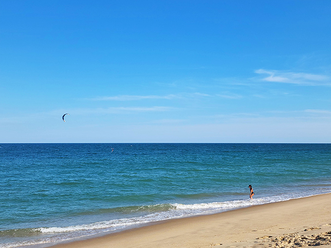 Golden sands meet azure waters in perfect harmony. Mother Nature showing off her color coordination skills at Delaware's most photogenic shoreline.