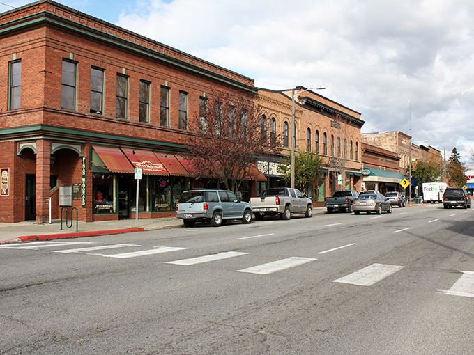 Historic brick buildings line First Avenue in Sandpoint, where charm isn't manufactured – it's been naturally aging to perfection since the early 1900s.