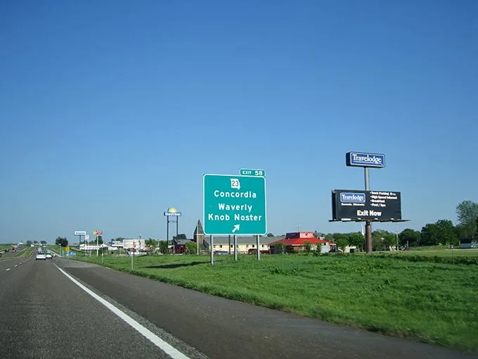 Highway signs point the way to Knob Noster – where your retirement dollars stretch further than your grandmother's homemade taffy at the county fair.