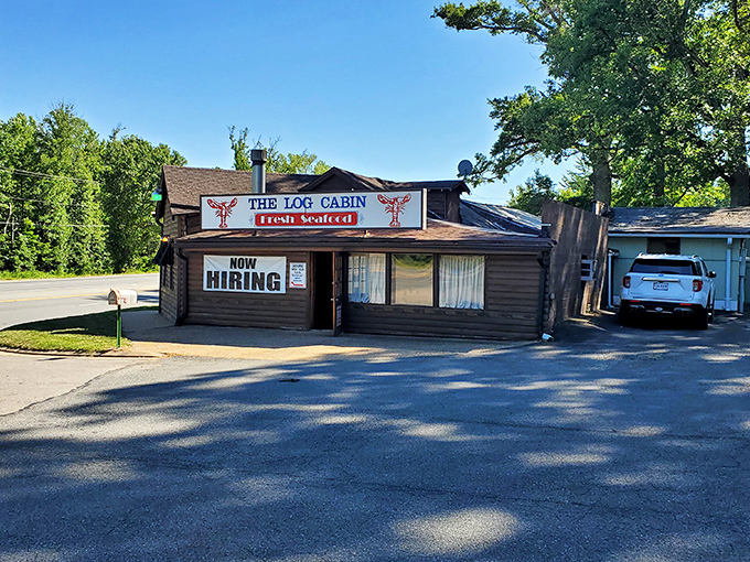 The rustic exterior of The Log Cabin isn't just charming—it's a promise that what awaits inside is authentic, unpretentious, and deliciously memorable.