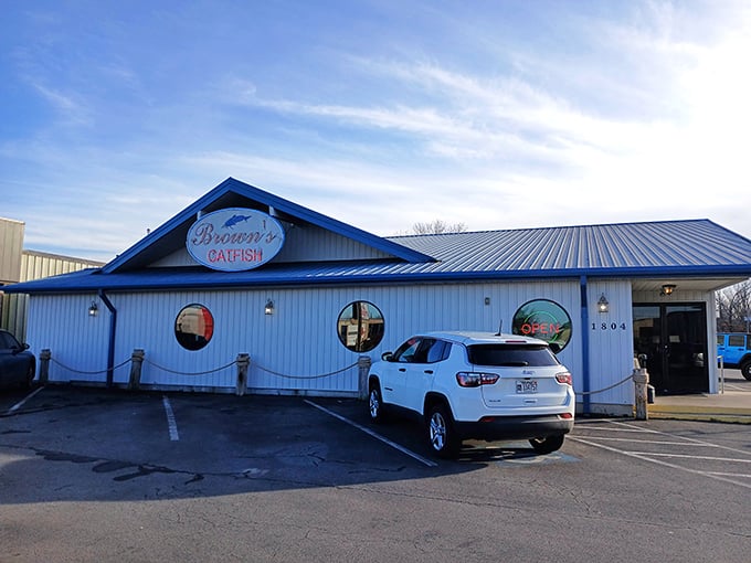The bright blue exterior of Brown's Catfish isn't just a beacon for hungry travelers—it's practically a bat signal for anyone craving perfectly fried seafood in Russellville.