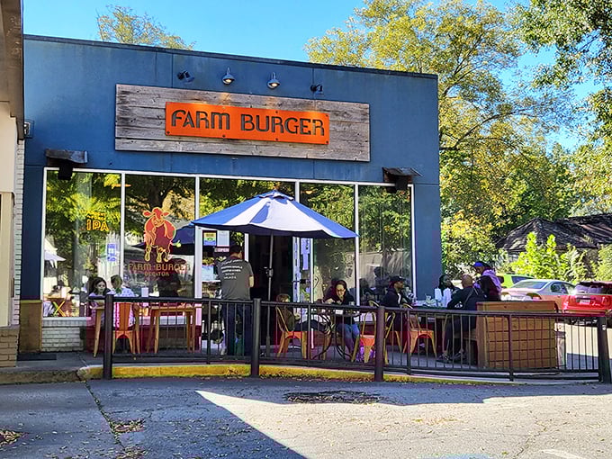 The blue facade with that rustic wooden sign is like a beacon for burger lovers. Farm-to-table isn’t just a buzzword here—it’s a delicious promise.