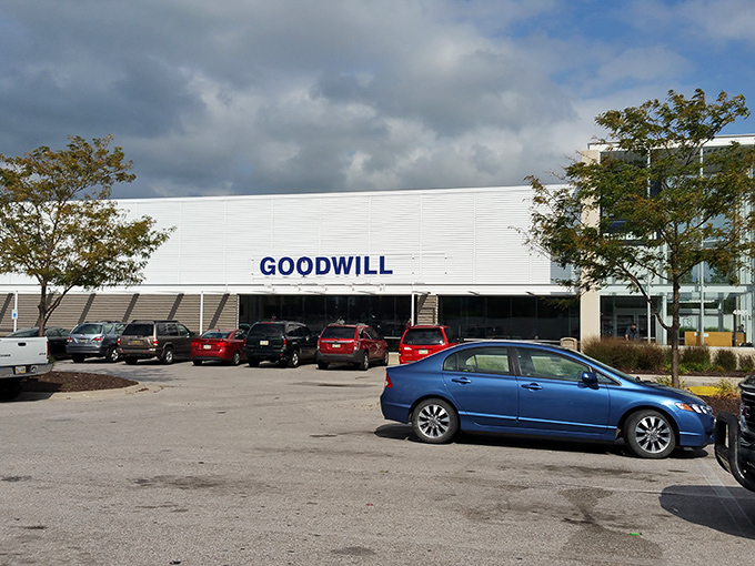 The modern exterior of Goodwill on 72nd Street beckons like a department store, but inside awaits a treasure hunt where every purchase helps the community.