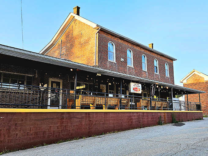 The historic brick building housing Stone's Family Restaurant stands proudly in Millhousen, its wraparound porch inviting hungry travelers to step back in time.