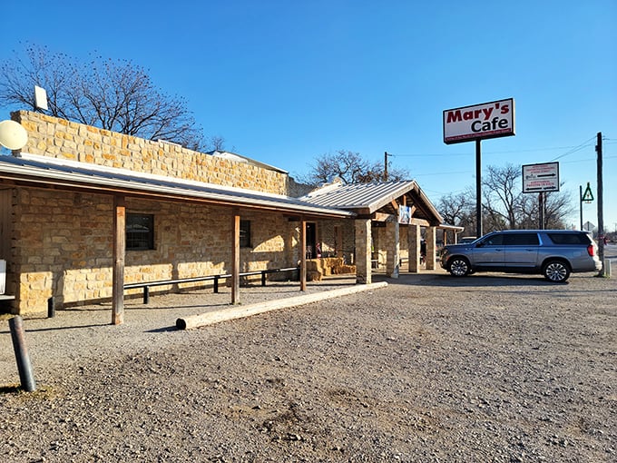 The limestone fortress of flavor stands proudly in Strawn, Texas, where culinary pilgrimages begin and diet plans go to die.