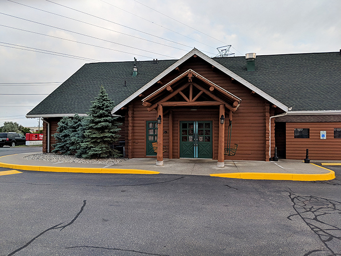 The rustic lodge-like exterior of Aspen Restaurant welcomes hungry travelers with its wooden façade and hanging plants, like a cozy mountain retreat transplanted to Macomb.