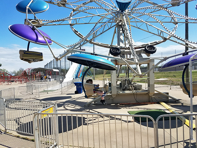 The Enterprise ride spins visitors in colorful saucer-shaped pods, delivering that perfect mix of thrill and "what have I gotten myself into?" adrenaline rush.