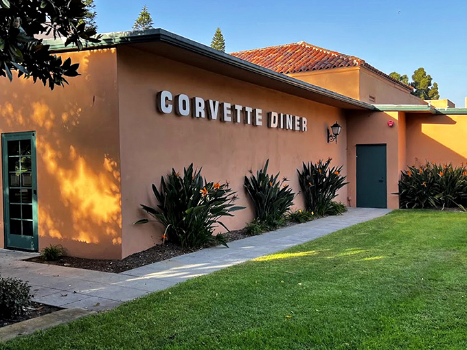 The unassuming terracotta exterior of Corvette Diner belies the neon explosion waiting inside, like a mild-mannered Clark Kent hiding his Superman persona.