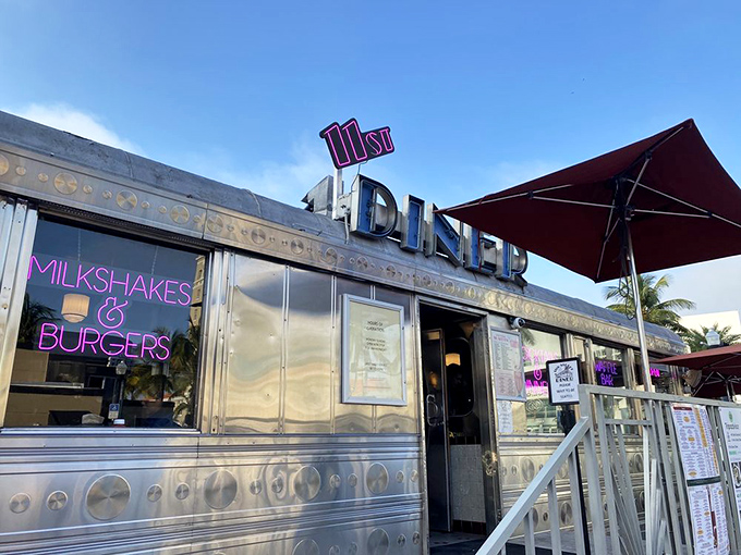 Chrome sweet chrome! This gleaming silver diner on Miami Beach's 11th Street promises nostalgic vibes and neon-lit indulgence at any hour.