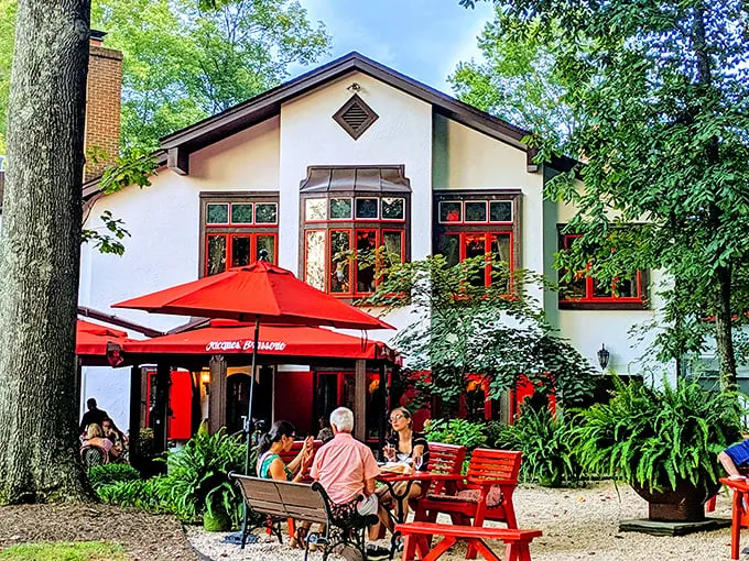 The charming exterior of L'Auberge Chez François looks like it was plucked from an Alsatian fairy tale and dropped into Virginia's countryside. Those red umbrellas practically whisper, "Come sit, stay awhile."