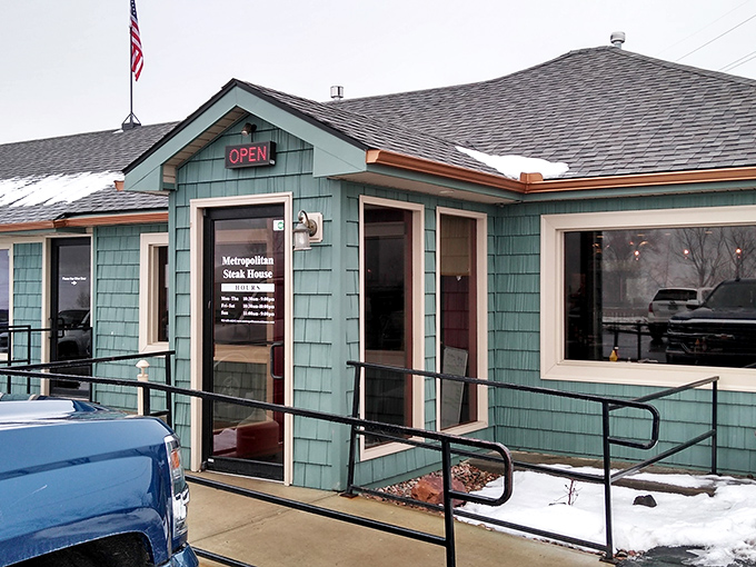 The little blue steakhouse with the big wooden sign says it all: "The Little Steak House Across From The Big House." Unpretentious perfection awaits.