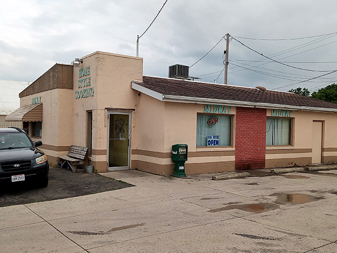 The unassuming exterior of Midway Restaurant stands as a beacon of breakfast hope in Kenton, where culinary magic happens behind that modest façade.