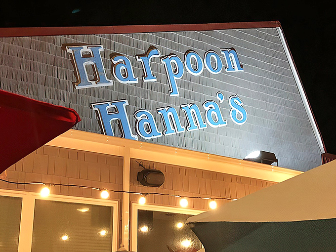 The iconic blue sign of Harpoon Hanna's welcomes hungry travelers like a coastal lighthouse guiding ships to safe harbor.