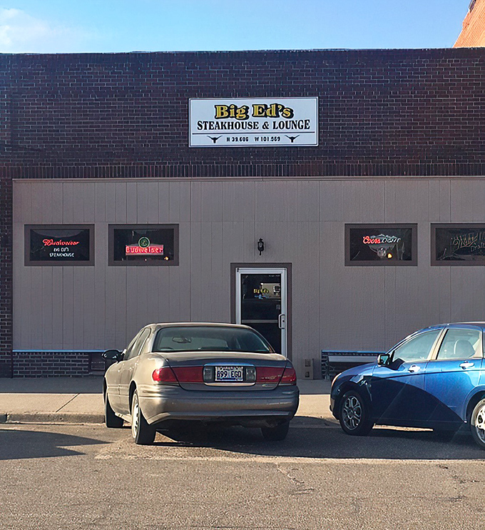 The GPS coordinates on Big Ed's sign aren't just for show—they're coordinates to carnivorous paradise in Bird City, where steak pilgrims navigate by satellite.