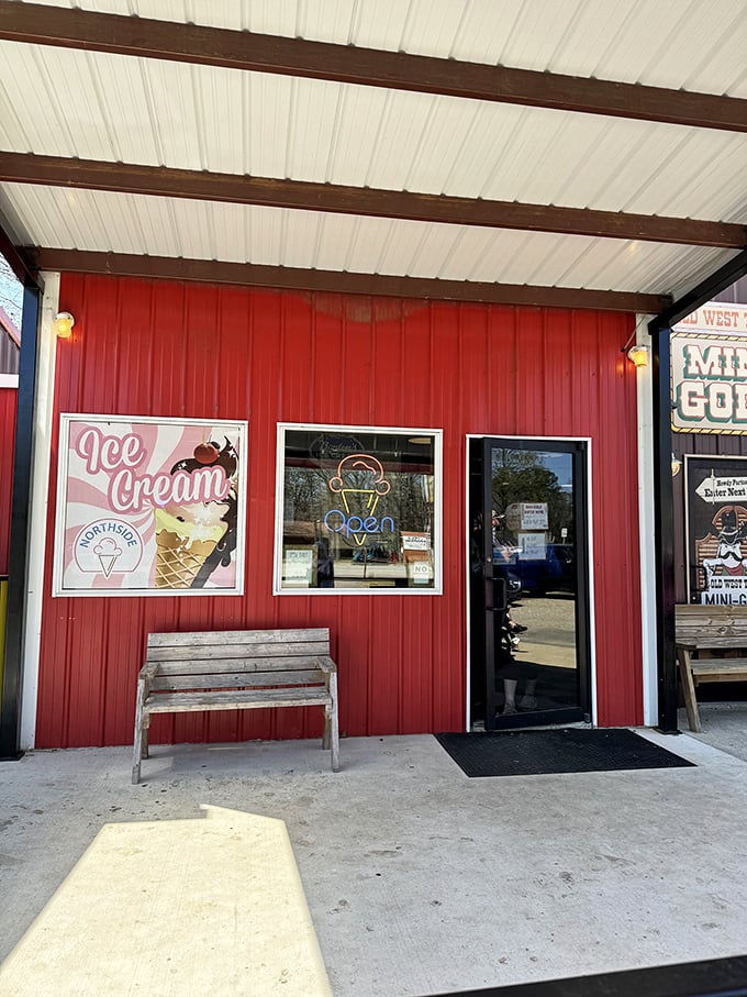 The cowboy statue and giant ice cream cone aren't just landmarks—they're sentinels guarding the gateway to frozen paradise in Broken Bow.