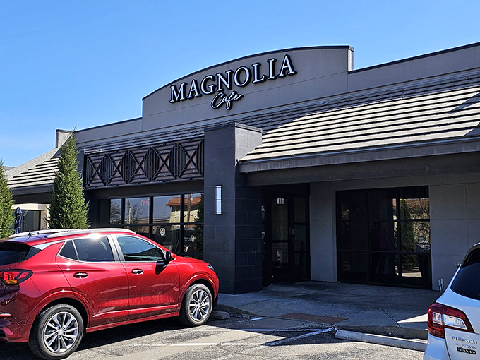 The sleek gray exterior of Magnolia Cafe stands like a culinary beacon in Wichita, promising delicious adventures within. That evergreen isn't just decoration—it's your first hint of the freshness awaiting inside.