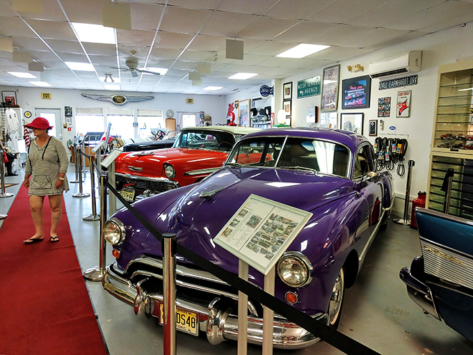 The unassuming gray exterior hides automotive treasures like your grandmother's secret recipe box—except instead of cookies, you'll find Cadillacs.