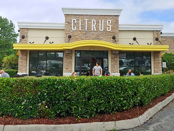 Citrus welcomes hungry visitors with its distinctive stone facade and cheerful yellow awning—like sunshine beckoning you to breakfast paradise.