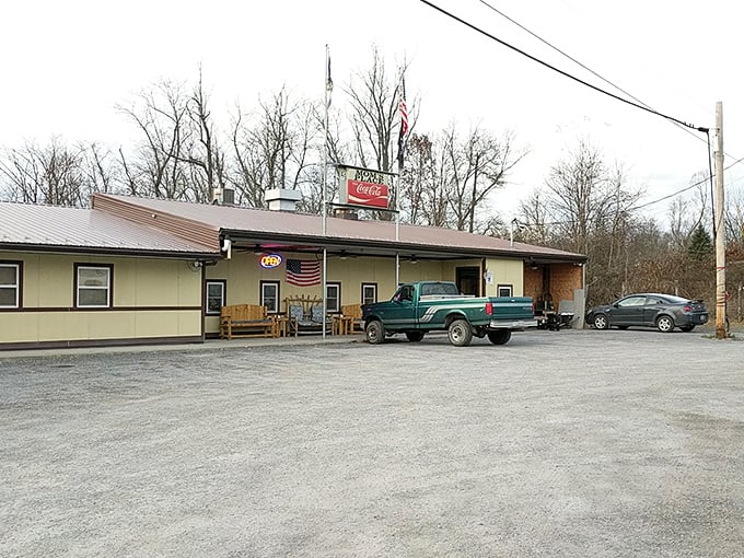 Mom's Place doesn't need fancy architecture to announce its greatness – that gravel parking lot filled with local trucks tells you everything you need to know.