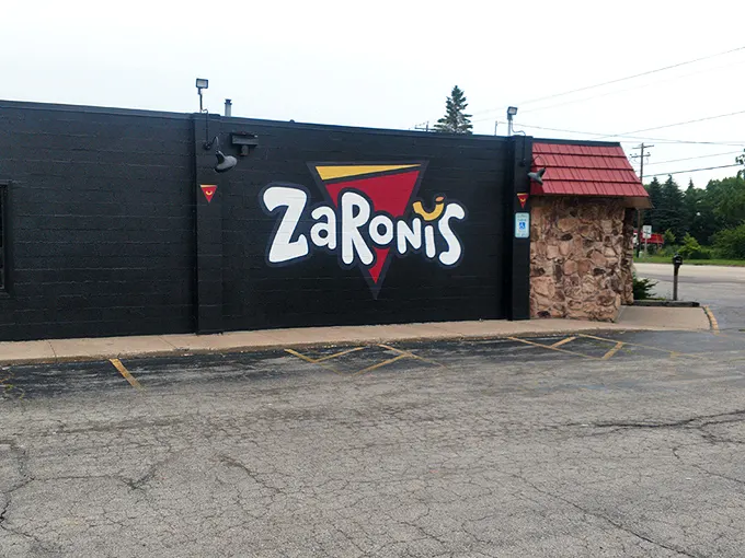 The bold, playful logo on ZaRoni's exterior wall is like a bat signal for the pizza-obsessed. Come for the quirky name, stay for the culinary adventure.