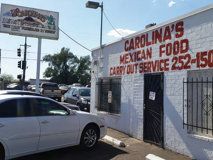The unassuming white brick exterior of Carolina's is like a culinary speakeasy—nothing fancy, just the promise of authentic Mexican greatness within.