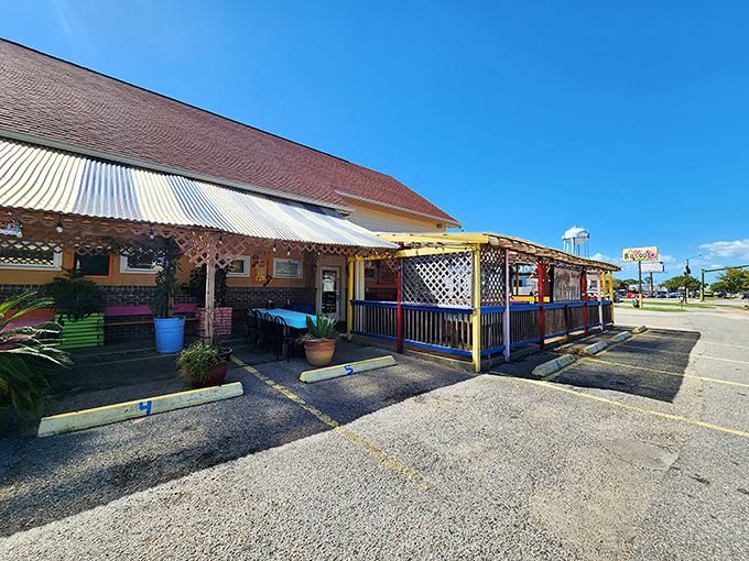 The cheerful yellow exterior of Pepe's Bosque beckons like an old friend, complete with a colorful patio that promises good times ahead. 