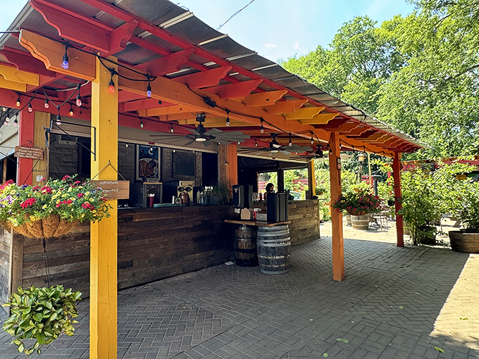 El Fuego's stone exterior with vibrant red trim stands out like a culinary lighthouse, beckoning hungry travelers with promises of authentic Mexican flavors.