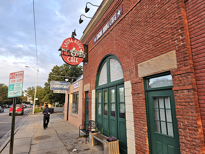 The historic brick facade of Engine House Cafe stands proudly against Nebraska's big sky, a beacon for breakfast enthusiasts and history buffs alike.