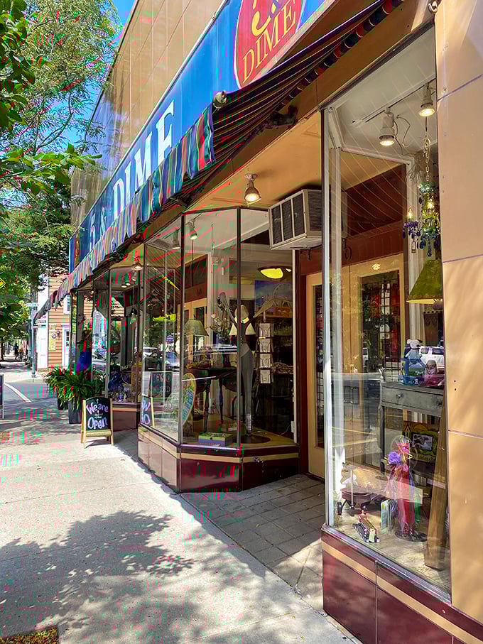 A Mano Galleries' storefront whispers promises of unique finds—part treasure chest, part time capsule, all temptation for the curious browser.