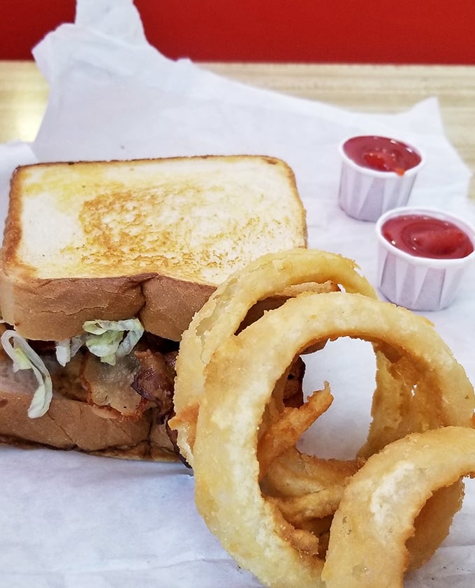 A sandwich so honest it should run for office—toasted bread, crisp lettuce, and the kind of simplicity that makes you wonder why anyone complicates food.