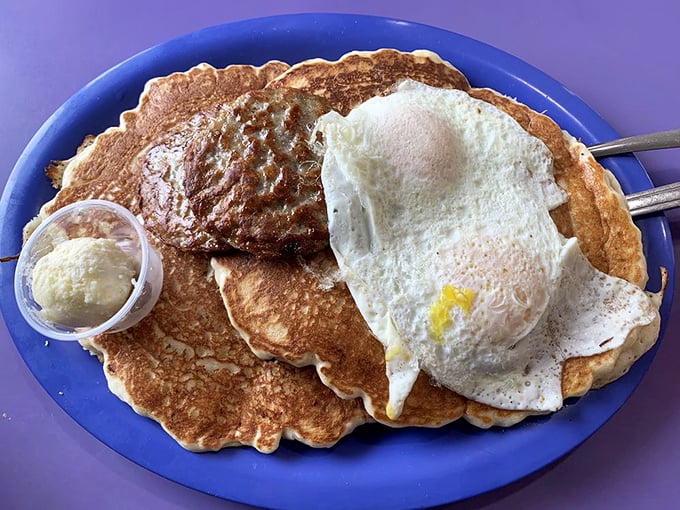 Pancakes that require no filter—just pure, fluffy satisfaction topped with an egg that's sunny-side perfect.