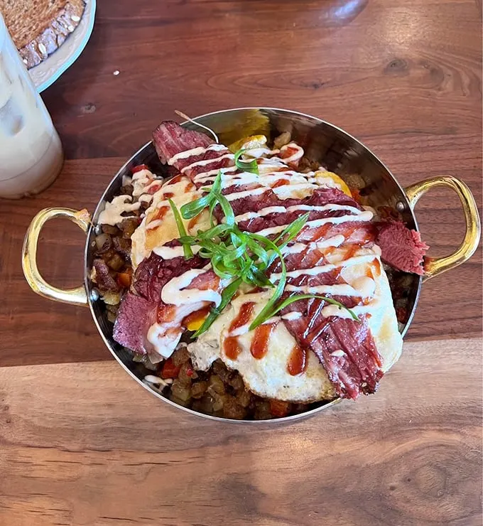 Skillet creations that sizzle with personality – where potatoes, eggs, and sauce converge in a morning performance worthy of a standing ovation.