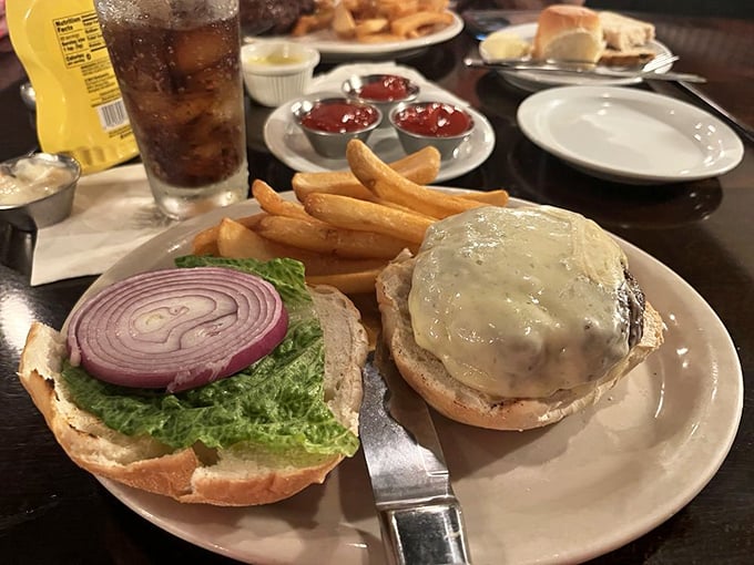 This isn't just a burger—it's the understudy that could steal the show, complete with the kind of fries that disappear one by one while you're talking.
