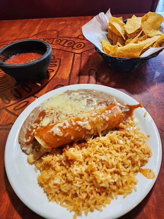 The chimichanga—where a burrito goes to get a golden tan and emerges as something gloriously crispy and indulgent.