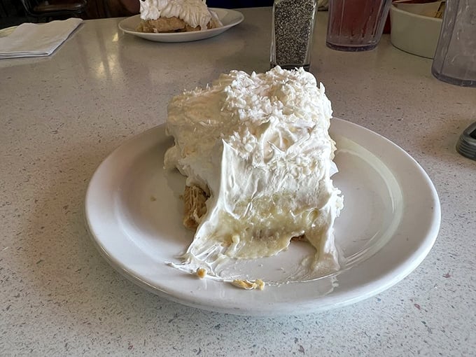 This isn't just pie—it's a cloud of coconut cream that makes you wonder why anyone bothers with birthday cake.