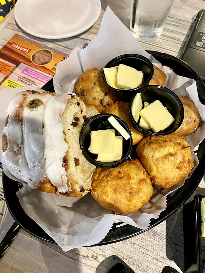 Bread basket that demands attention—these aren't just obligatory table fillers; they're worth saving room for.
