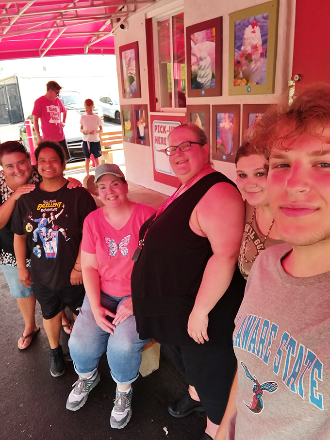 The happiest queue in Delaware forms here daily. These smiles aren't just for the camera—they're anticipating that first heavenly bite.