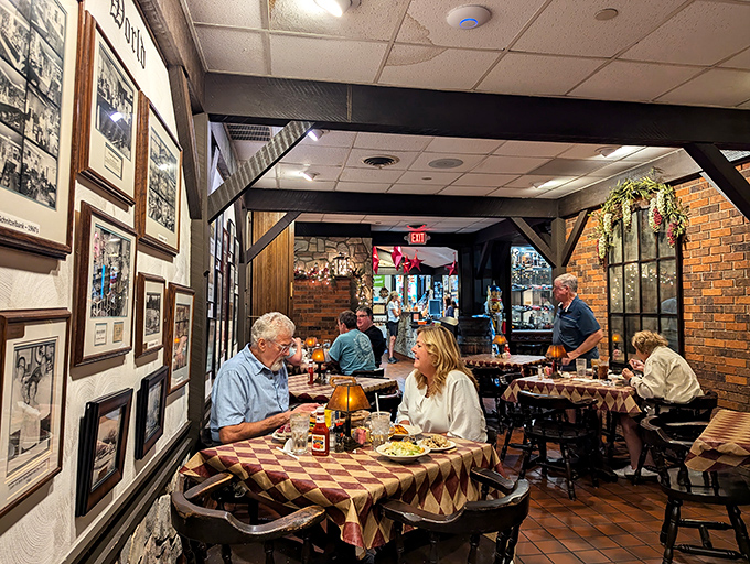 Generations of diners have created memories at these tables. The wall of photographs isn't just decor—it's visual proof that good taste runs in families.