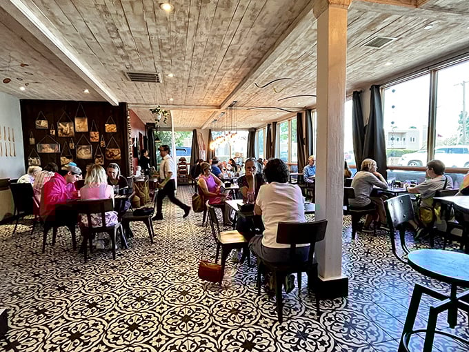 The patterned floor tiles and whitewashed ceiling create a space where Santa Fe meets Saint-Germain, and everyone's invited to the party.