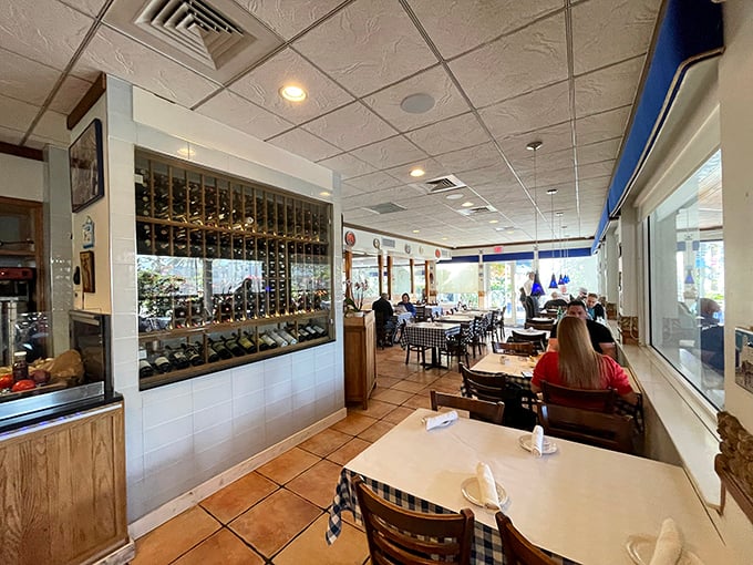 The dining room buzzes with the energy of shared meals and stories. Those wine racks aren't decoration—they're liquid anticipation.