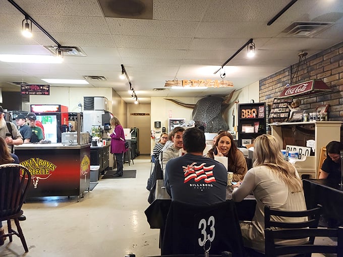 No fancy tablecloths needed when the food speaks this eloquently. These diners aren't just eating—they're having a religious experience with smoke and fire.