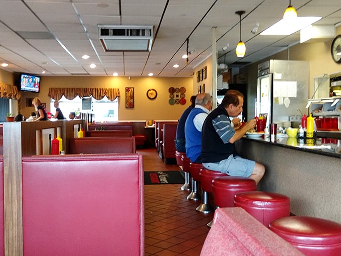 Where locals gather and visitors become regulars. These red booths have heard more Michigan stories than any history book ever written.