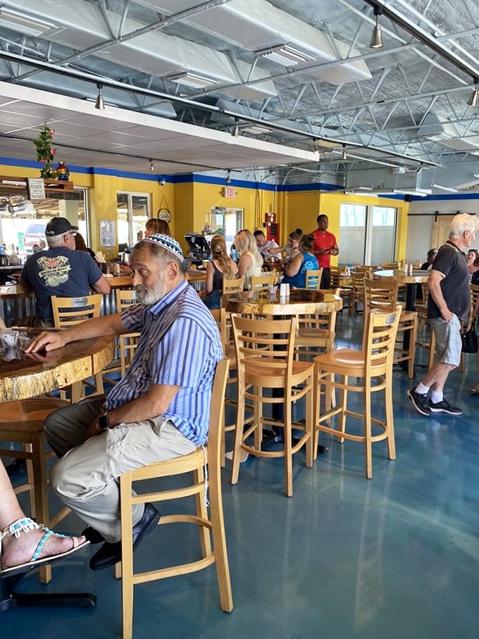 Where breakfast dreams come true. Patrons gather at wooden tables, participating in the sacred morning ritual of deciding between sweet and savory.