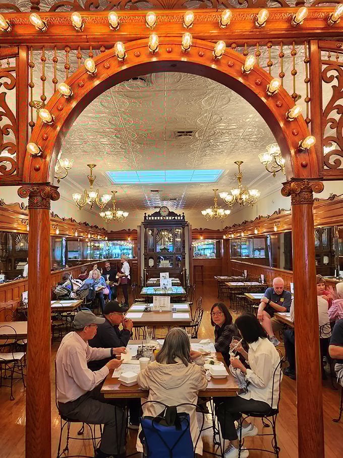 Where strangers become neighbors under the glow of antique lights. This isn't just dining – it's community building, one sundae at a time.