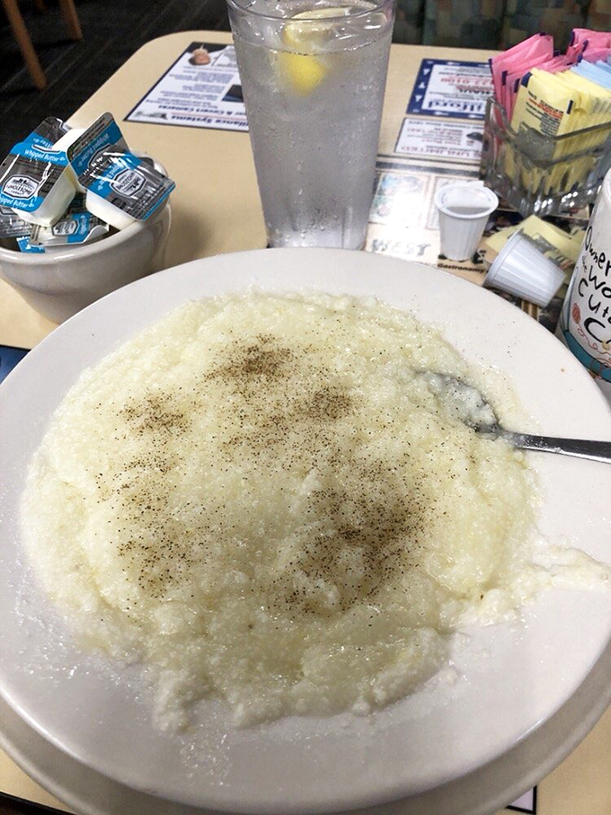 Grits with a sprinkling of black pepper – a canvas awaiting your creativity. Southerners would approve of this creamy, stick-to-your-ribs classic.