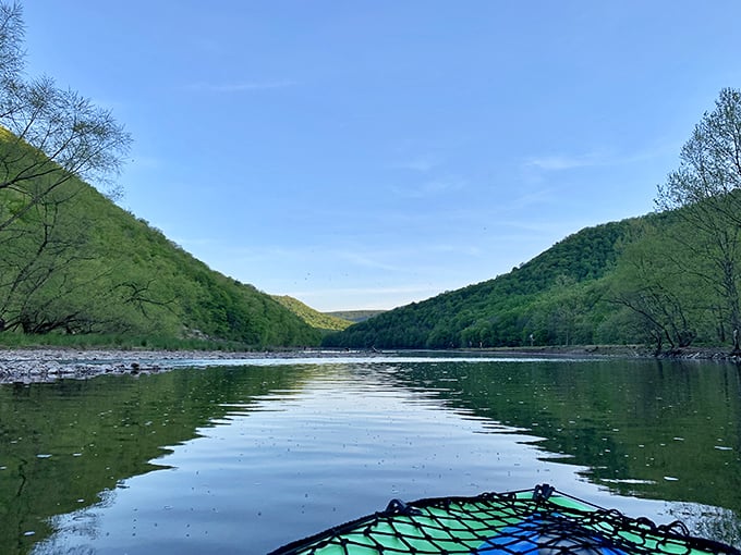 Gliding across emerald waters between mountain sentinels—kayaking here makes you feel like you've discovered your own private wilderness.