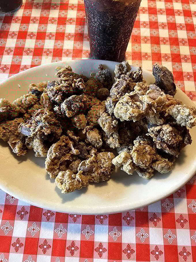 Crispy, craggy chicken livers and gizzards—the parts most restaurants discard become treasures in the hands of Stroud's kitchen magicians.