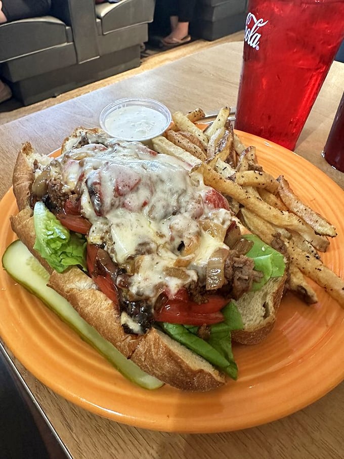 A sandwich so loaded it requires strategic planning to eat—architecture and lunch combined in one glorious creation.
