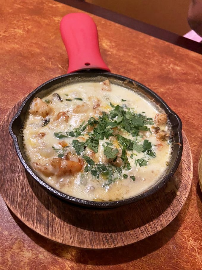 This bubbling skillet of creamy comfort isn't trying to win beauty contests—it's aiming straight for your soul. Cilantro makes everything look like it's making an effort.